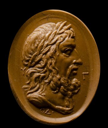An important greek agate intaglio. Bust of Zeus with letters ...