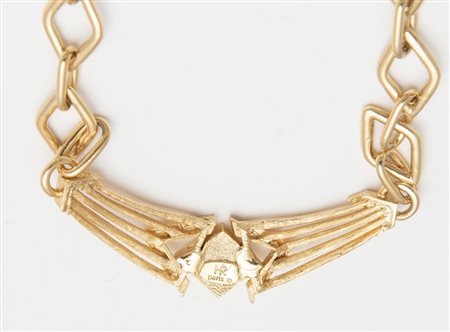 HELENA RUBINSTEIN Collier dorato con strass centrali. Reca marchio a ...